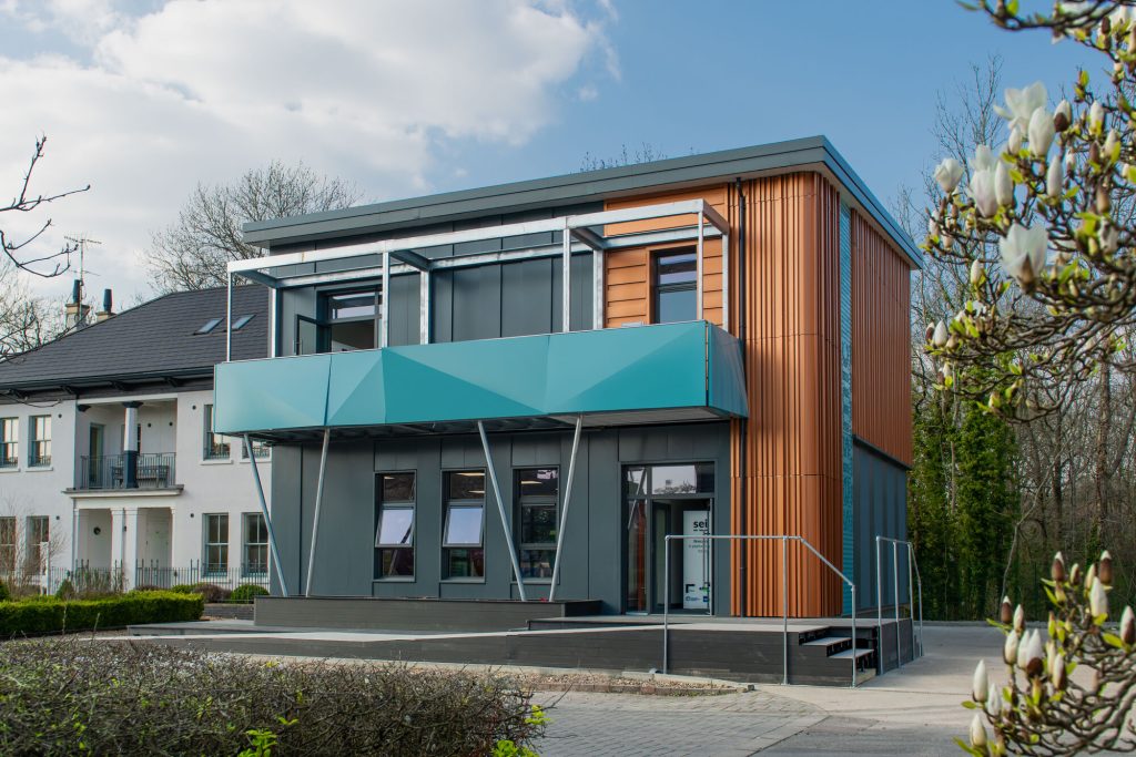 AIM ADDS ACOUSTIC AND FIRE STOP ELEMENTS TO GROUND-BREAKING BUILDING ...